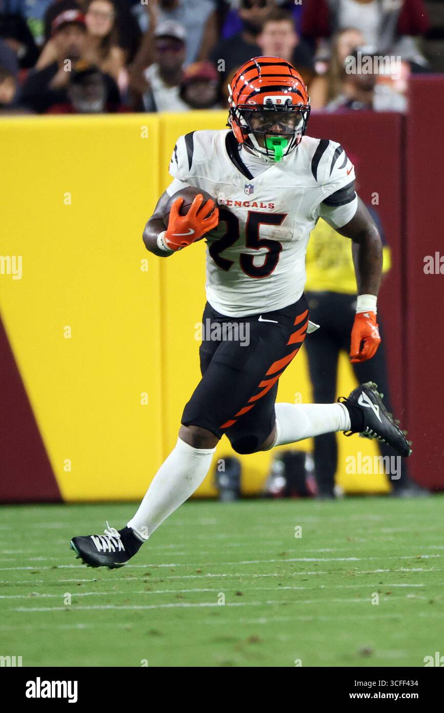Cincinnati Bengals running back Tahj Brooks (25) runs with the ball ...