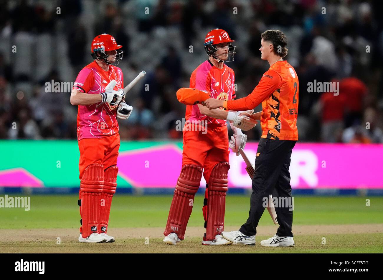 Welsh Fire's Tom Abell shakes hands with Birmingham Phoenix's Jacob ...