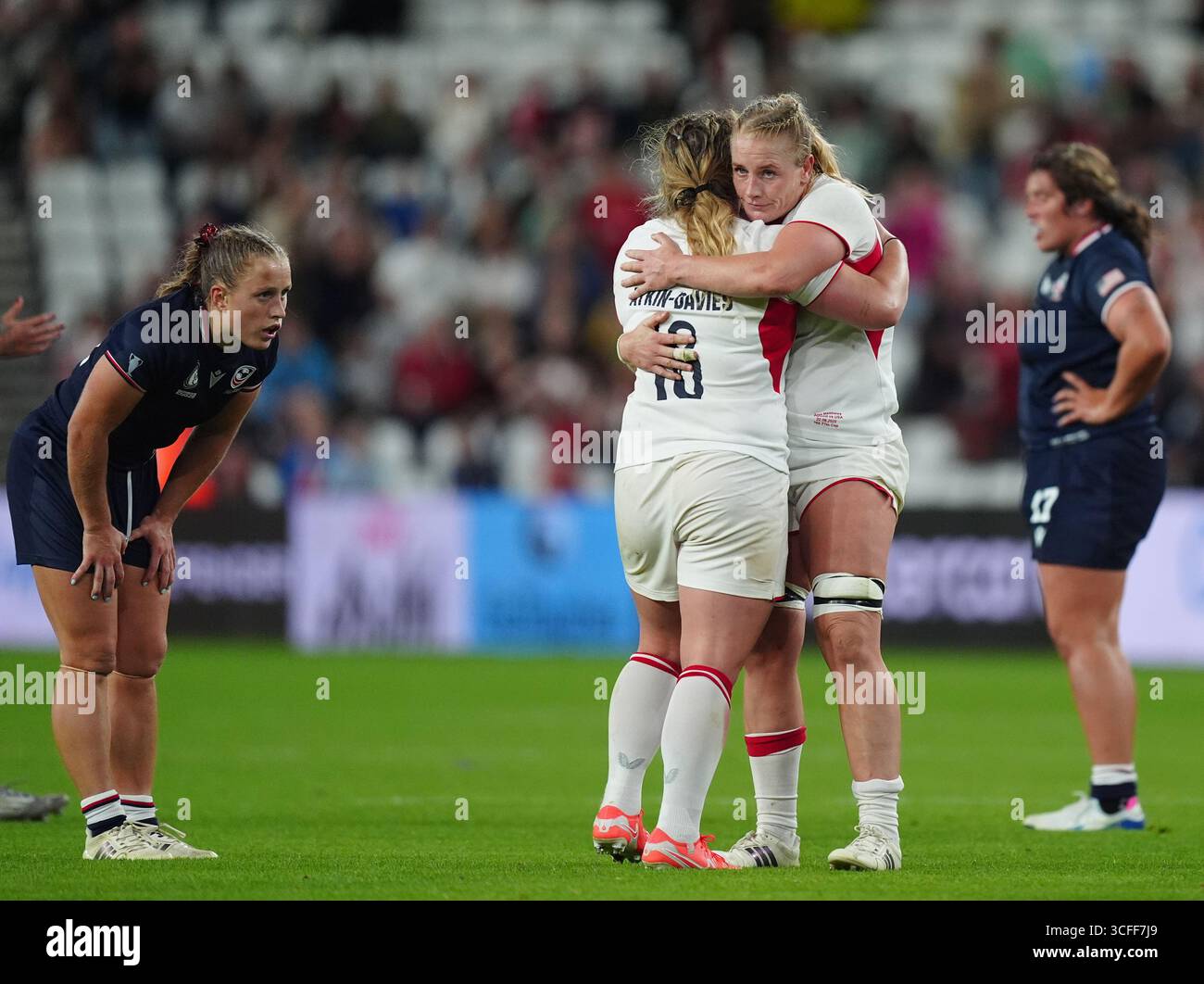 England's Lark Atkin-Davies (centre left) and England's Alex Matthews ...