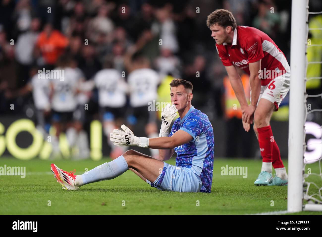 Bristol City goalkeeper Radek Vitek (left) reacts after Derby County's ...