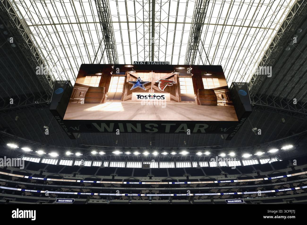 The videoboard at AT&T Stadium in a general stadium view (GV) shows the ...