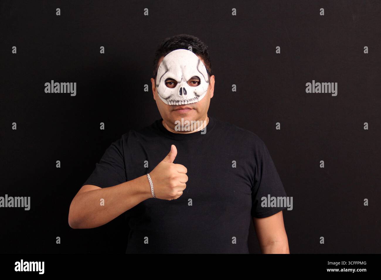 Man wearing a skull mask like Catrin to celebrate the traditional ...