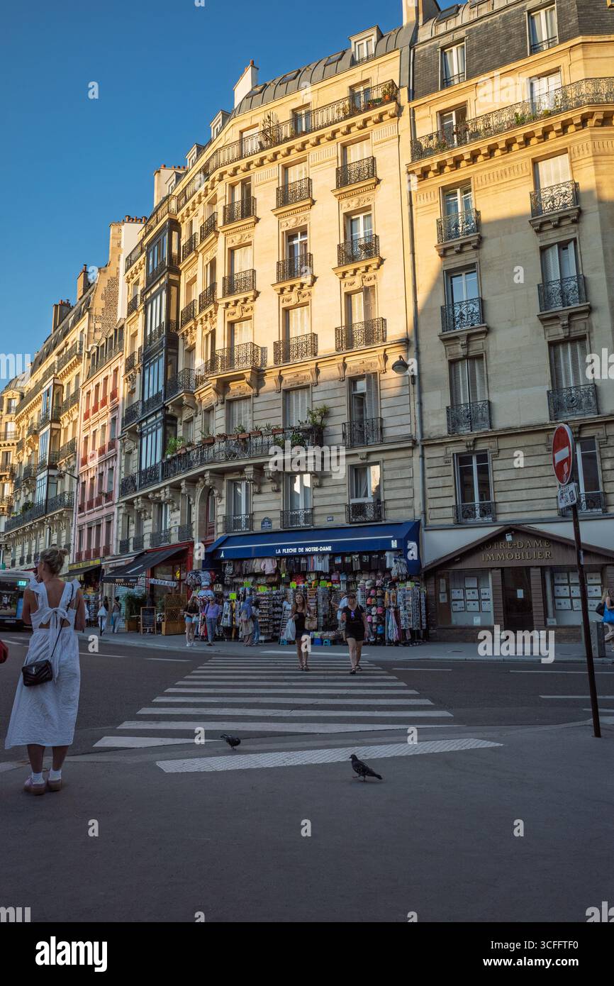 A classic Haussmannian building in Paris with a crosswalk where ...