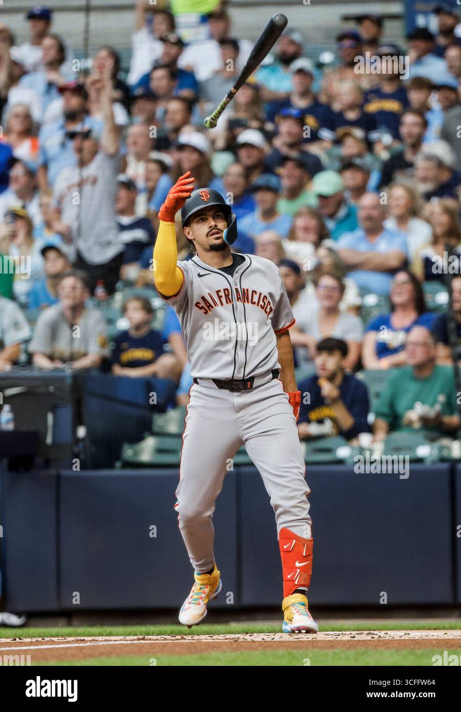 San Francisco Giants shortstop Willy Adames flips his bat as he hits a ...