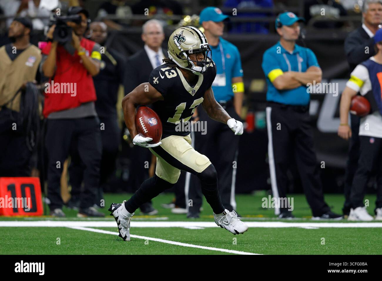 New Orleans Saints running back Velus Jones Jr. (13) runs the ball ...