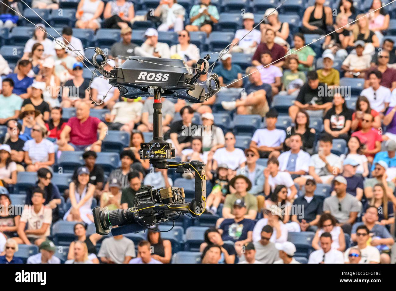 New York, USA. 22nd Aug, 2025. A remote controlled video camera hangs ...