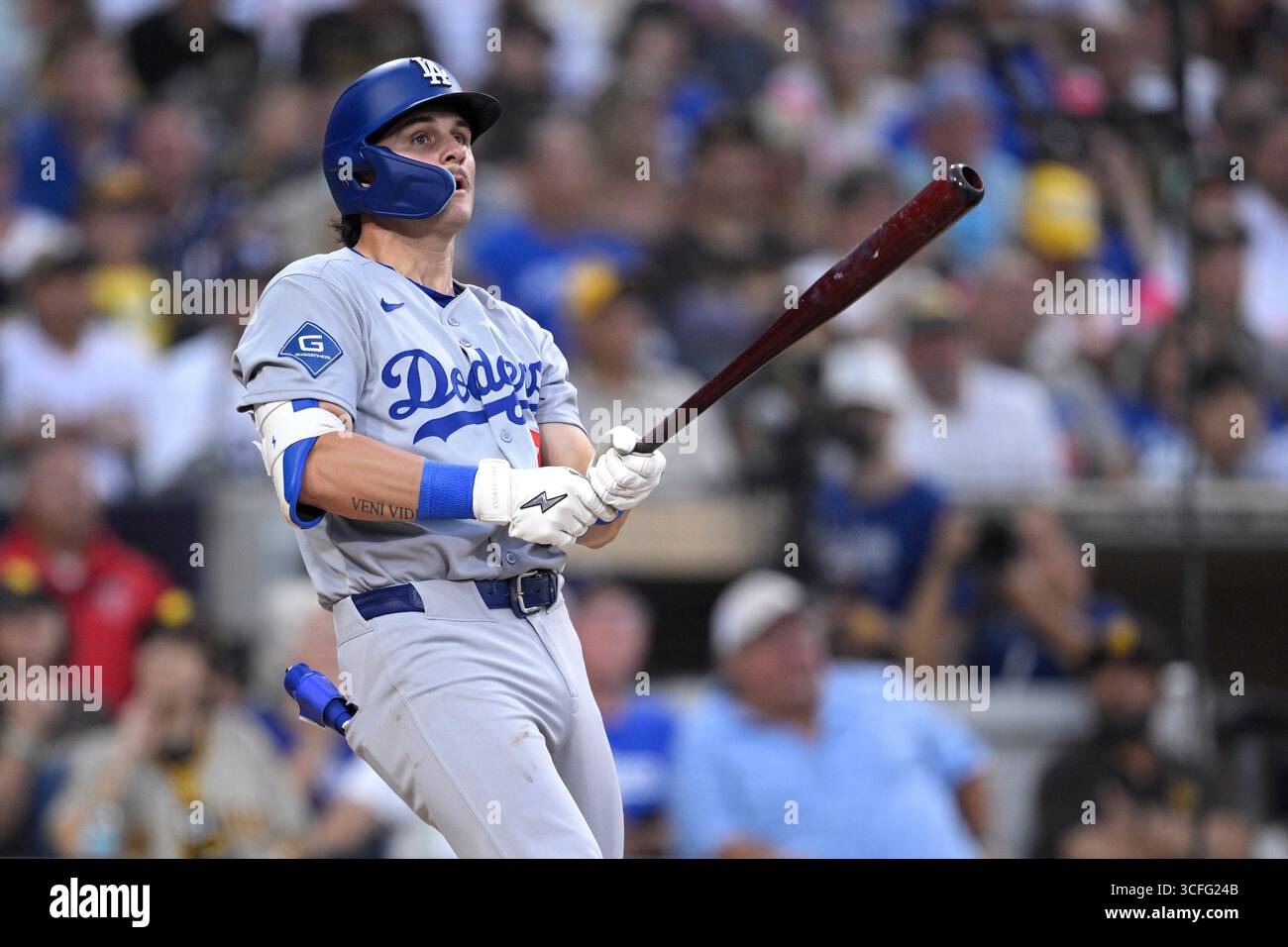 Los Angeles Dodgers' Alex Freeland watches his solo home run during the ...