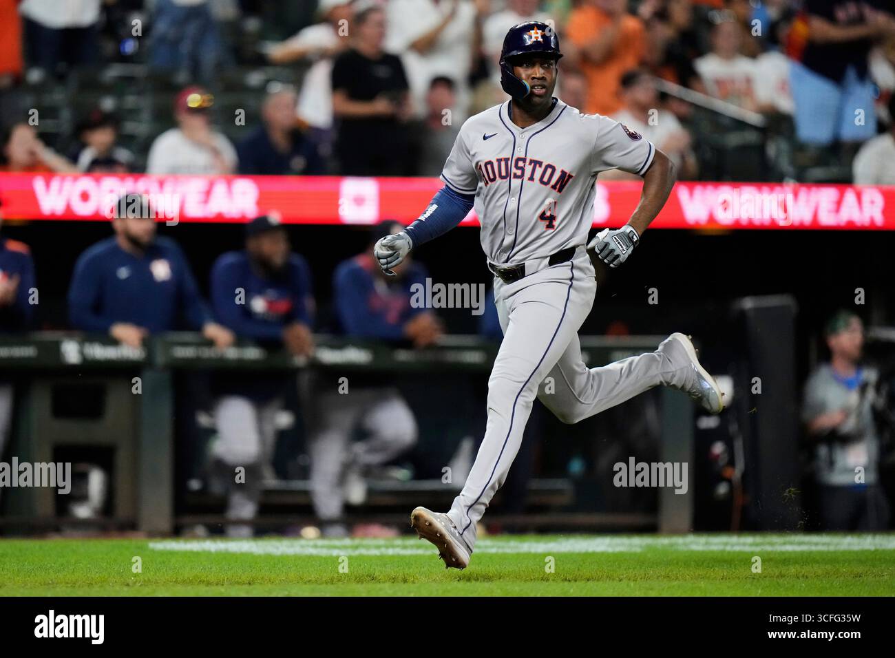 Houston Astros' Jesus Sanchez (4) advances toward home plate to score ...