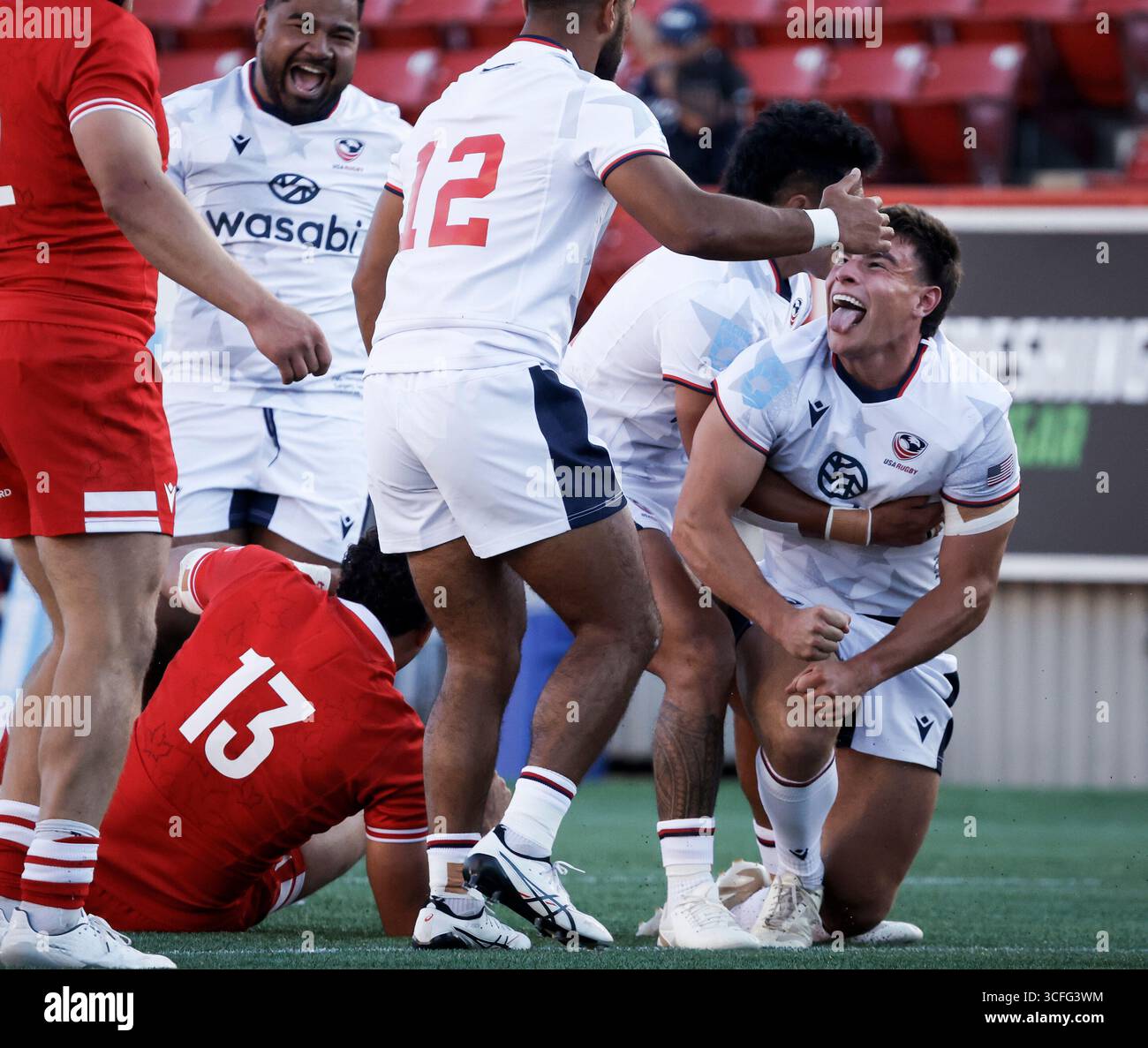 United States' Lauina Futi, right, celebrates after his try with ...