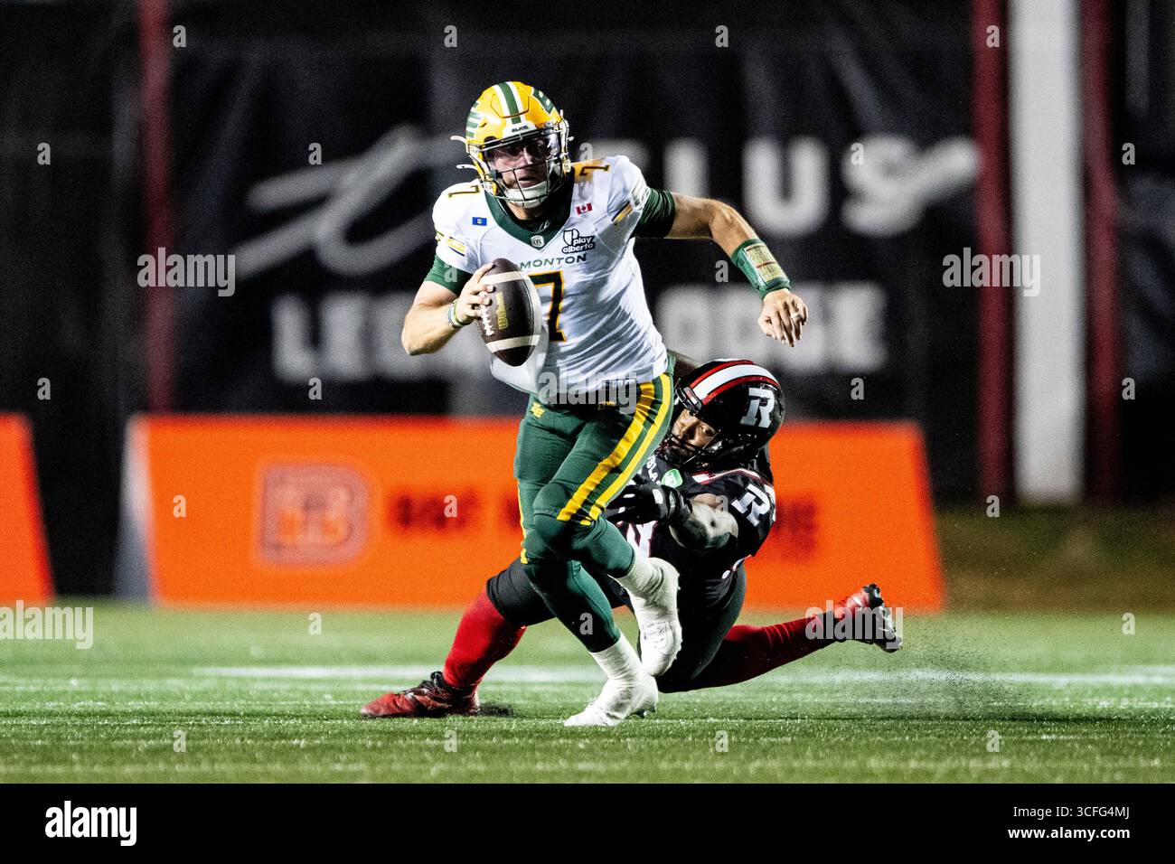 Ottawa Redblacks defensive lineman Aidan John (93) tries to tackle ...