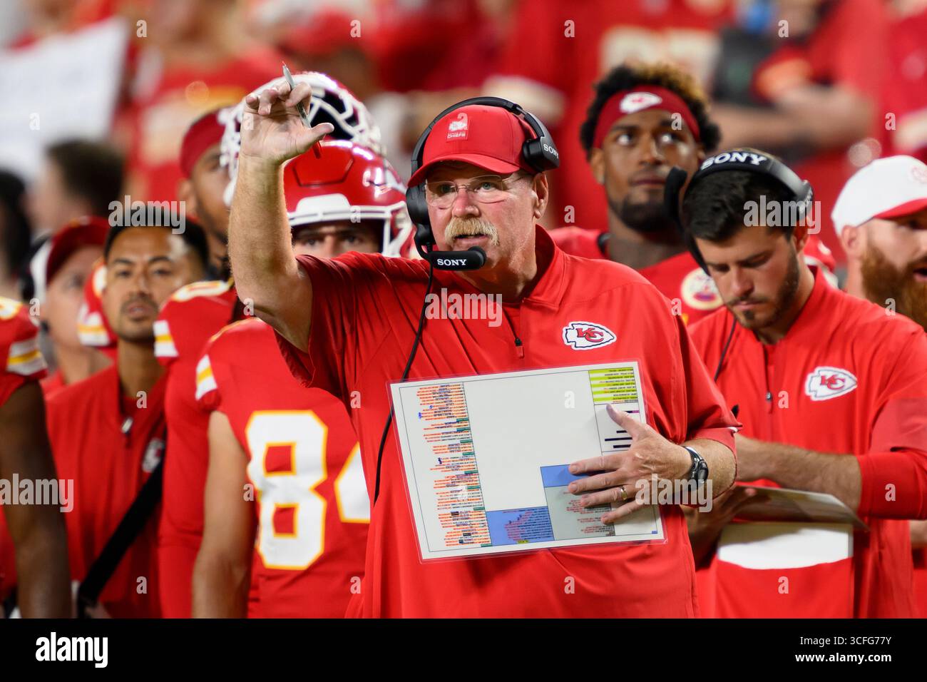 Kansas City Chiefs head coach Andy Reid motions to his team during the ...