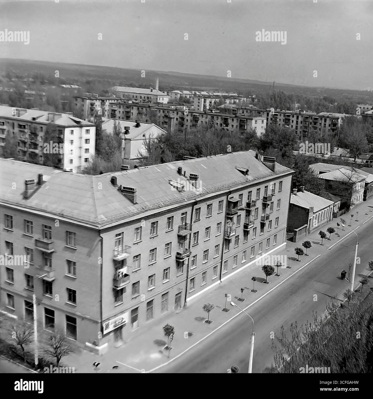 A view of a "Stalinka" residential building on Yunykh Kommunarov Street ...