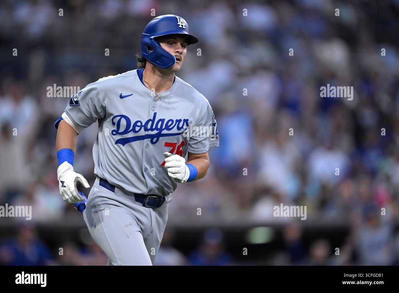 Los Angeles Dodgers' Alex Freeland rounds the bases after hitting a ...