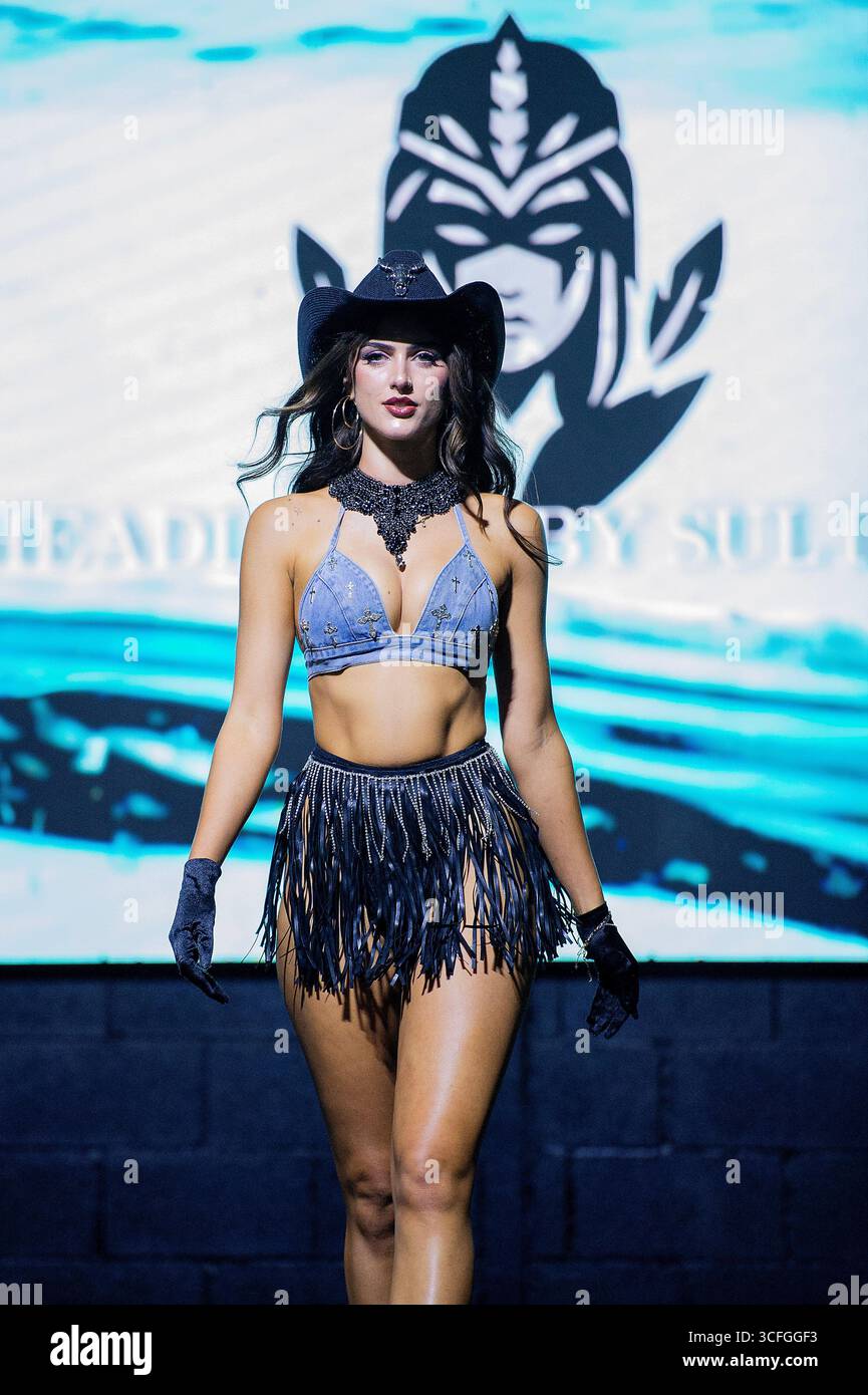 August 22, 2025: A model walks the runway during Austin Swim Week at FridayÃ s night time runway ...