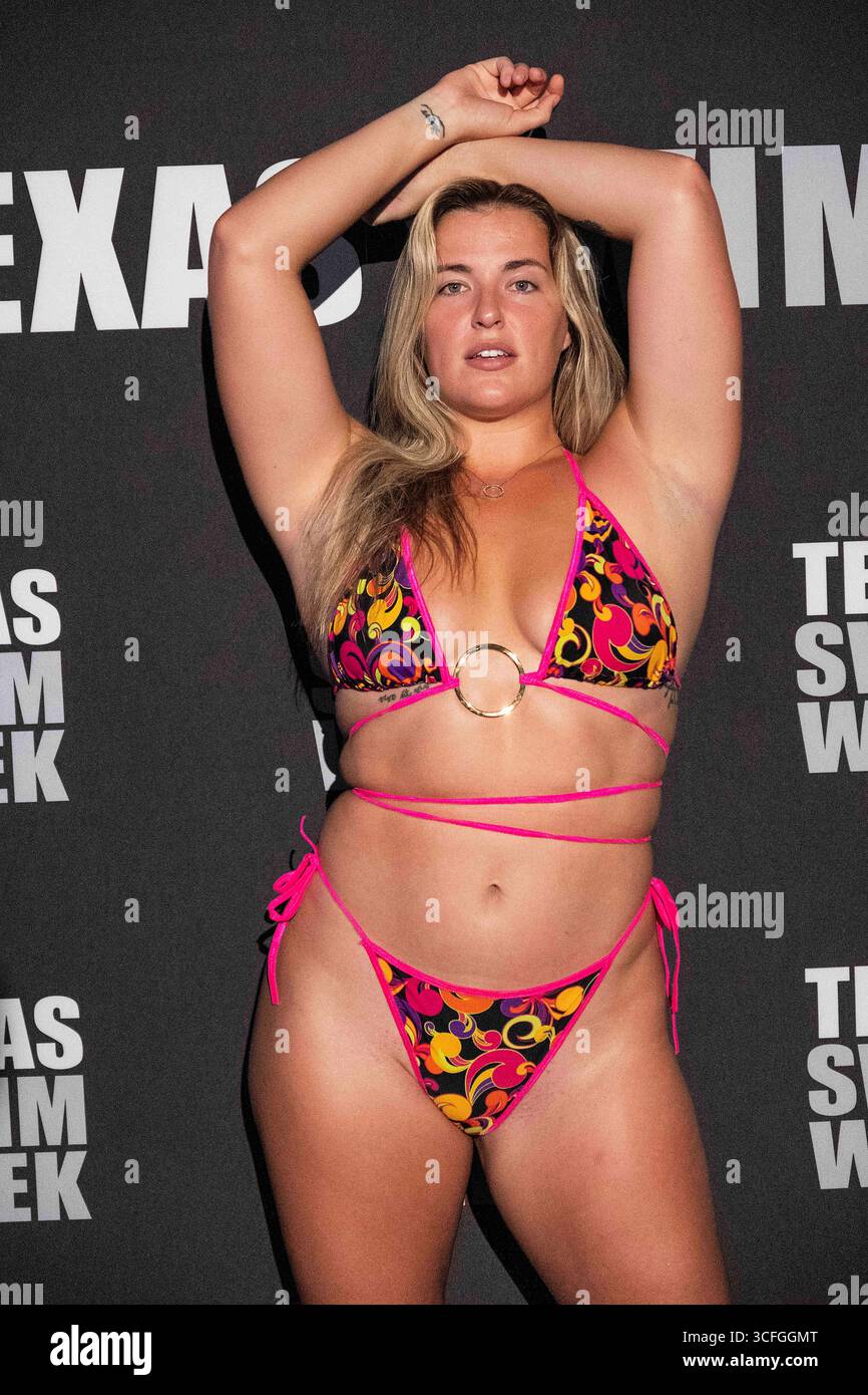 August 22, 2025: A model posing during Austin Swim Week at FridayÕs night time runway show at ...