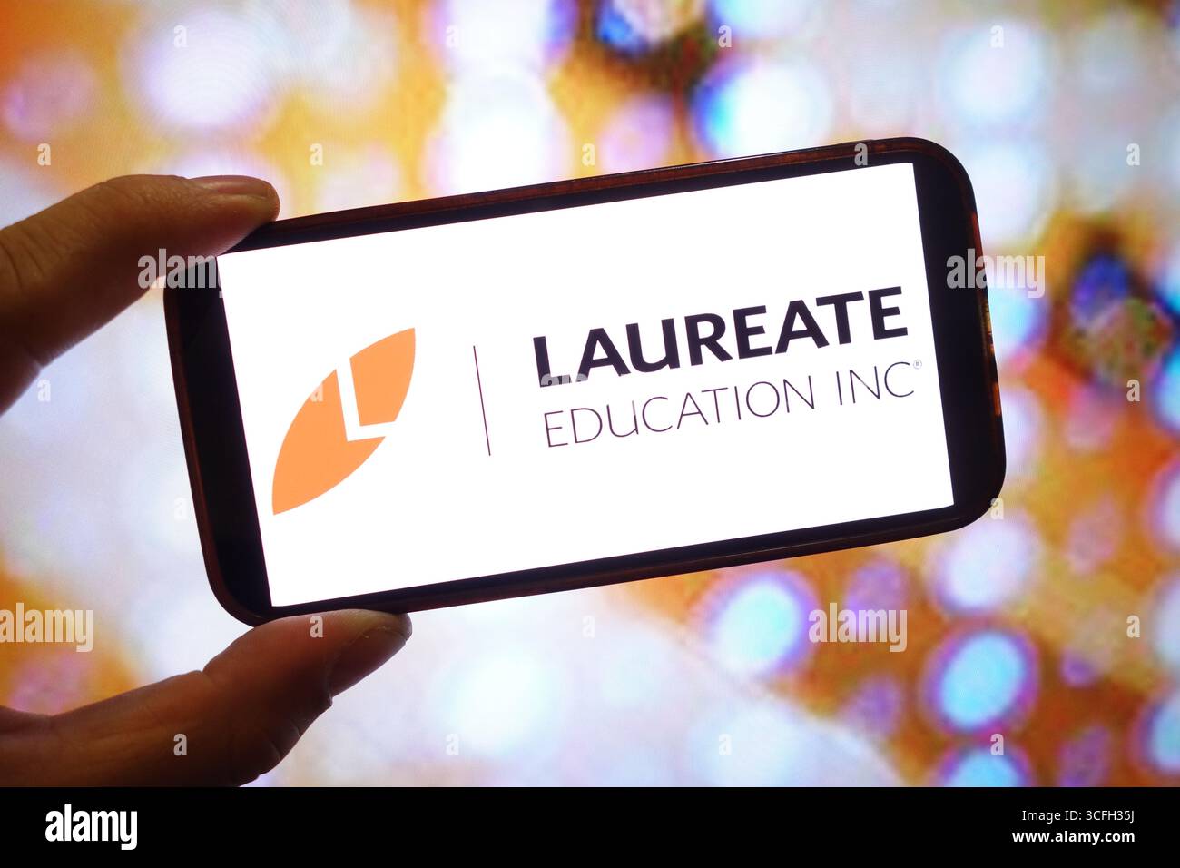 In this photo illustration, a Laureate Education company logo is seen ...