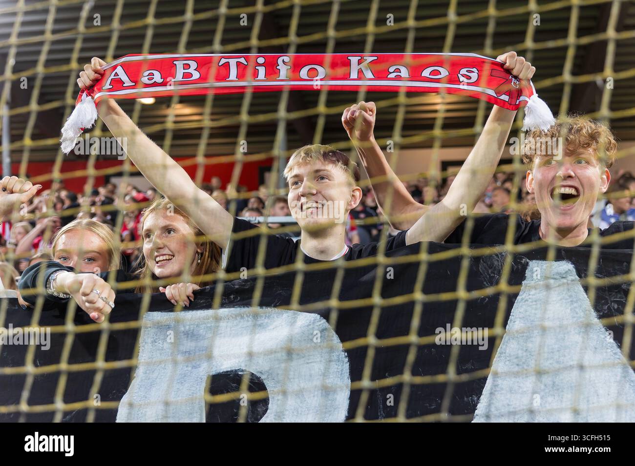 Aalborg, Denmark. August 22nd. 2025. Football fans of AaB seen on the ...