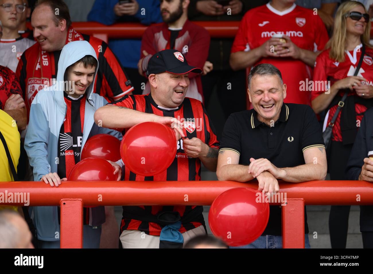 Morecambe fans in the stands before the Enterprise National League match at Mazuma Mobile ...