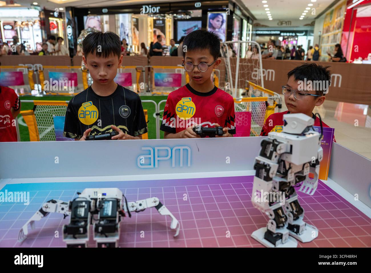 Hong Kong AI Robot Event Children playing with robots at an AI Robot ...