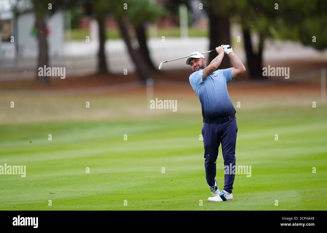Andy Sullivan plays his second shot on the first hole during day three ...