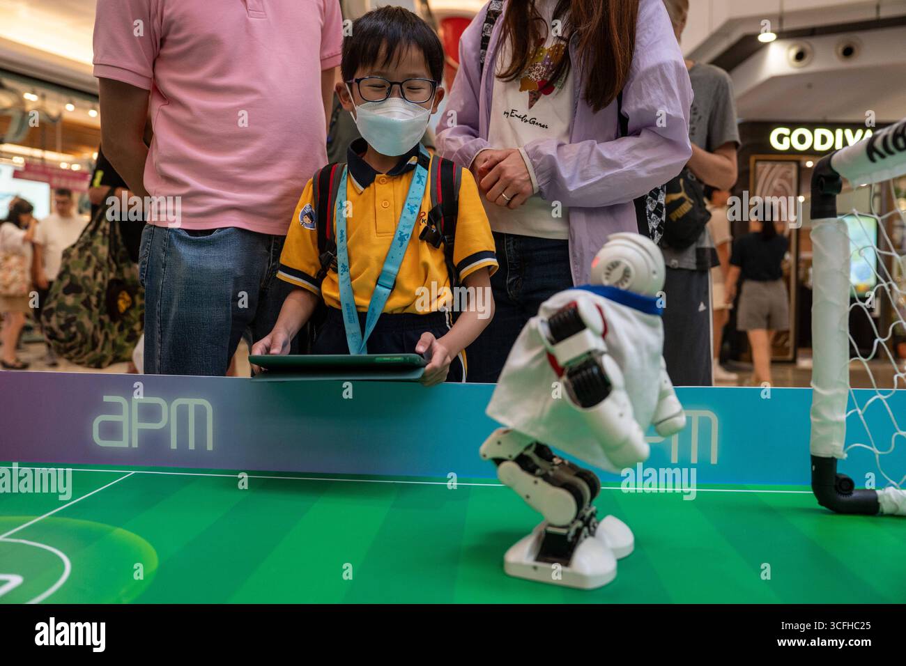 Hong Kong AI Robot Event Children playing with robots at an AI Robot ...