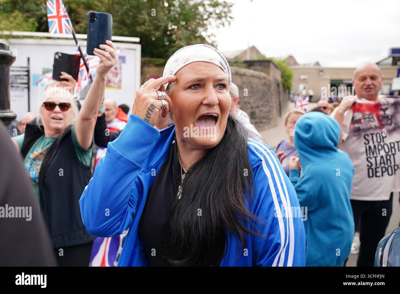 People demonstrating at an Abolish Asylum System protest outside the ...