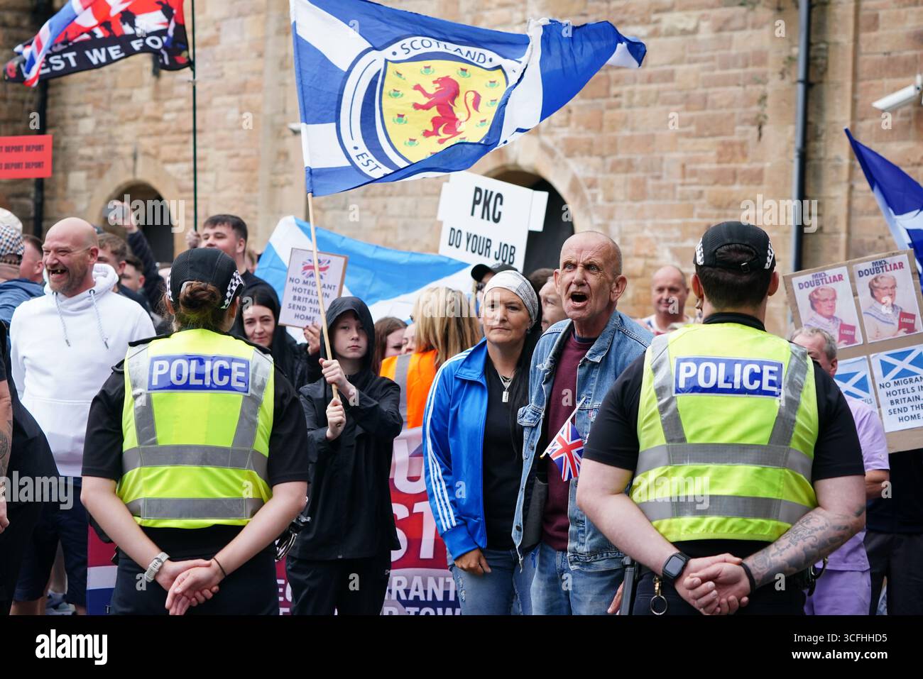 People demonstrating at an Abolish Asylum System protest outside the ...