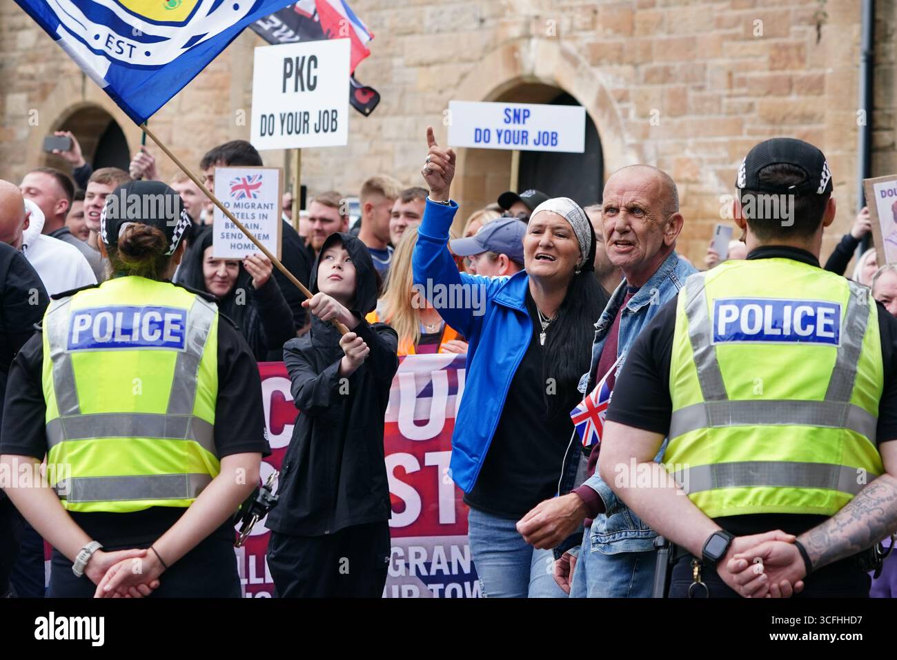 People demonstrating at an Abolish Asylum System protest outside the ...