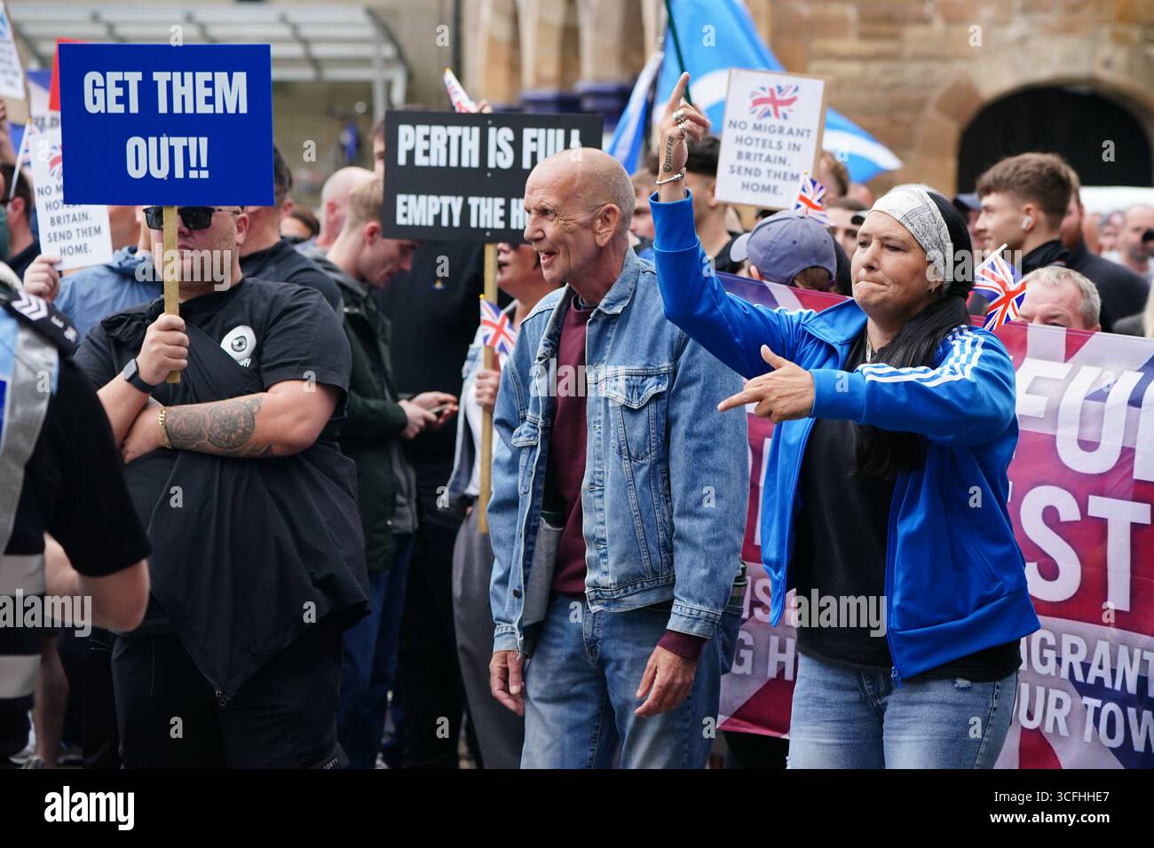 People demonstrating at an Abolish Asylum System protest outside the ...
