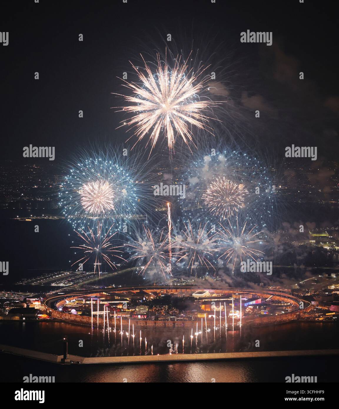 An aerial photo shows fireworks illuminating the night sky at the Osaka ...