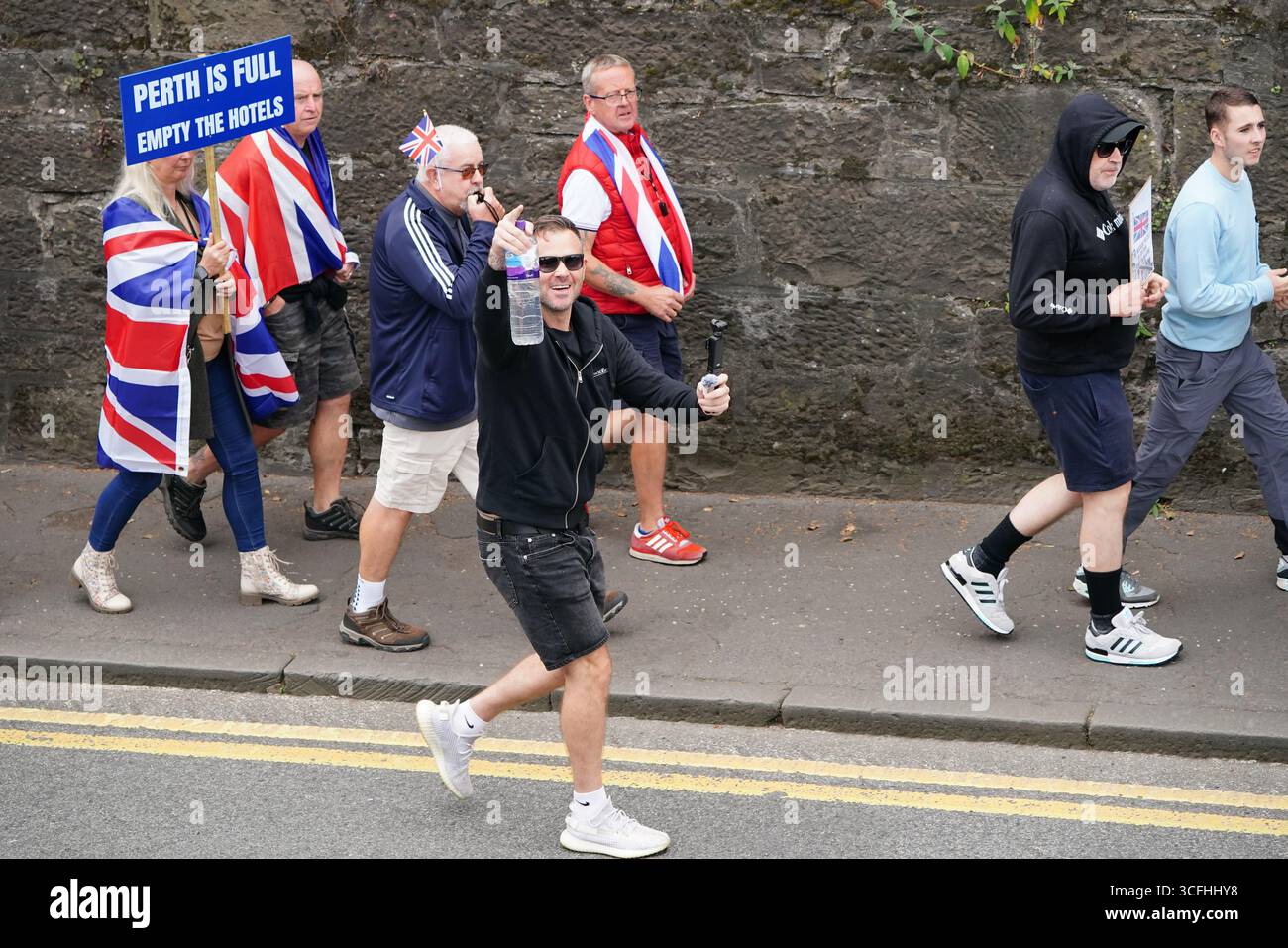 People demonstrating at an Abolish Asylum System protest near the ...