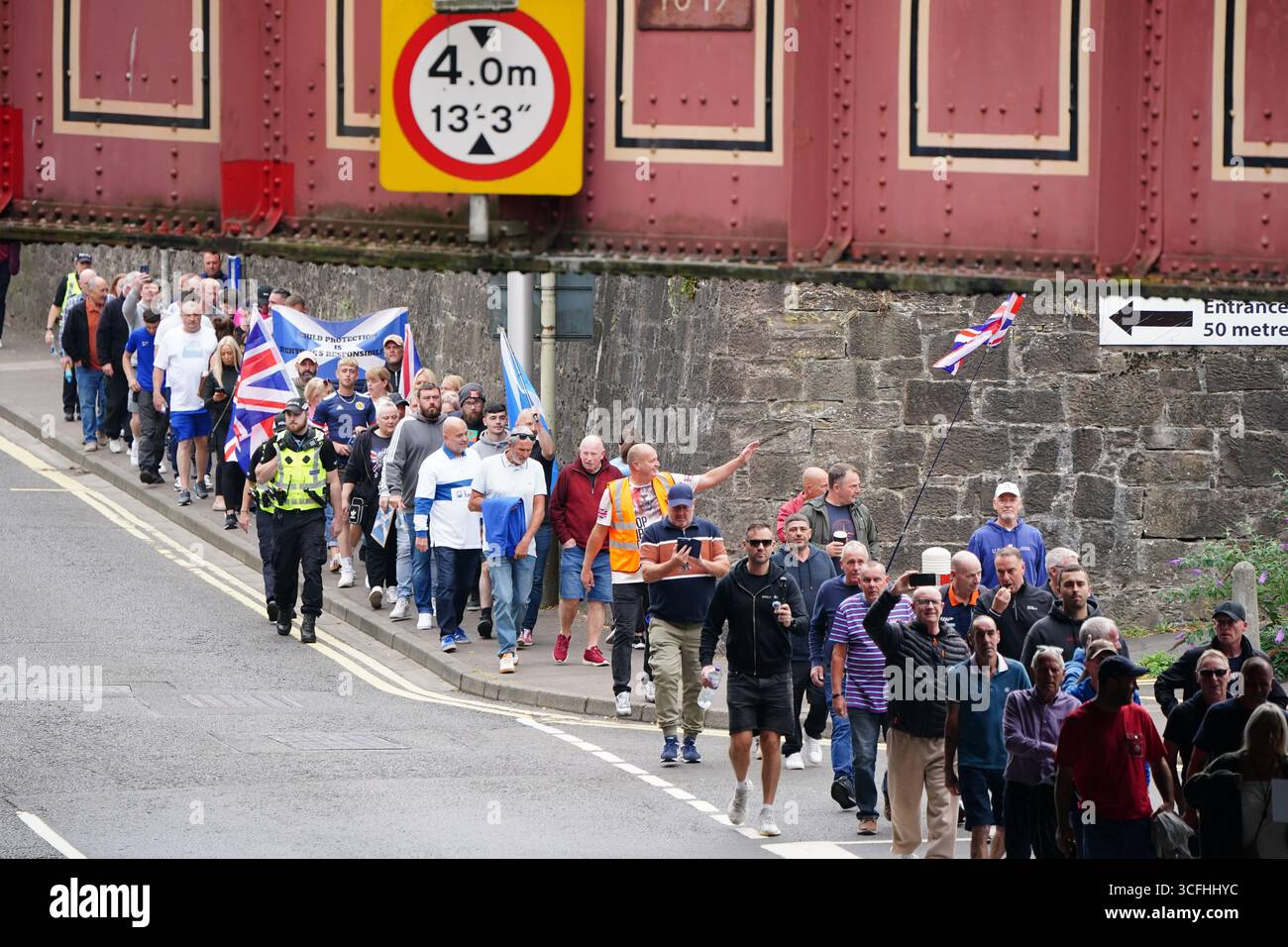 People demonstrating at an Abolish Asylum System protest near the ...