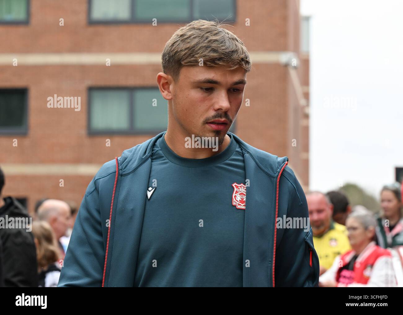 Wrexham's Callum Doyle arrives ahead of the Sky Bet Championship match ...