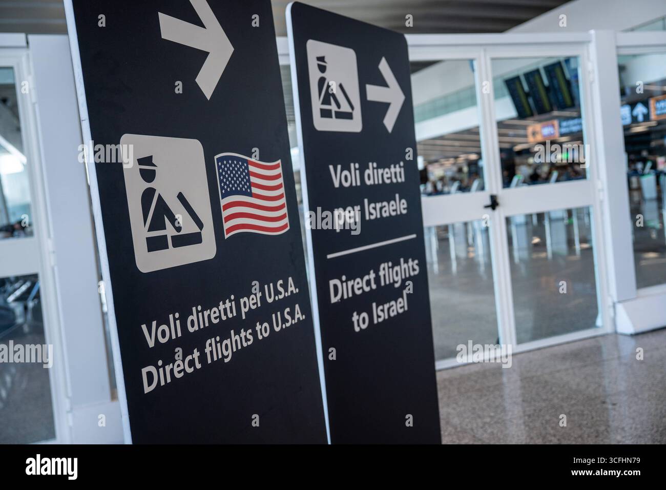 Daily Life in Rome A sign showing direct flights to USA and Israel at ...