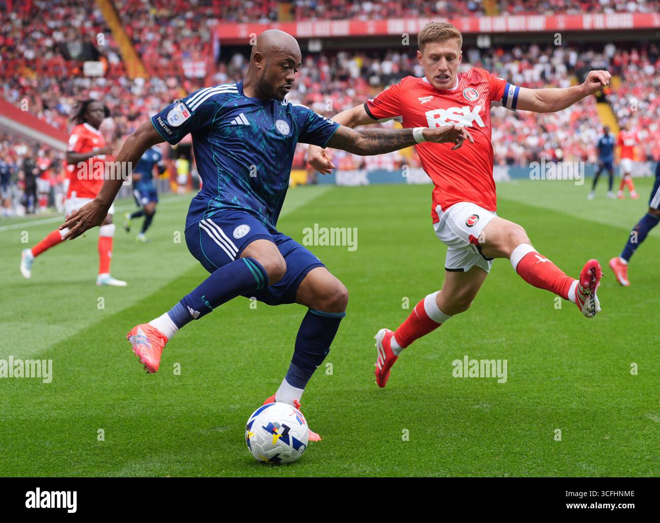 Leicester City's Jordan Ayew and Charlton Athletic's Greg Docherty a ...