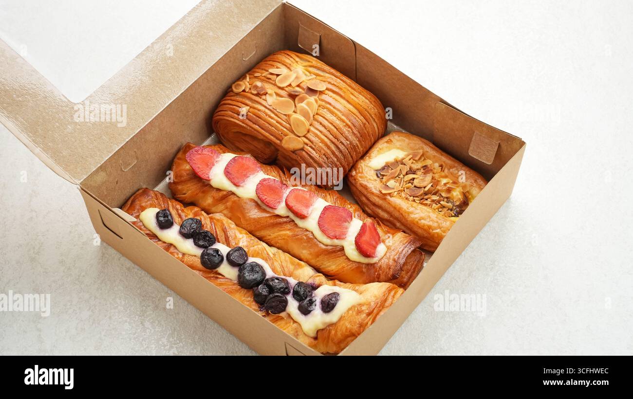 Pastries in a box hi-res stock photography and images - Alamy