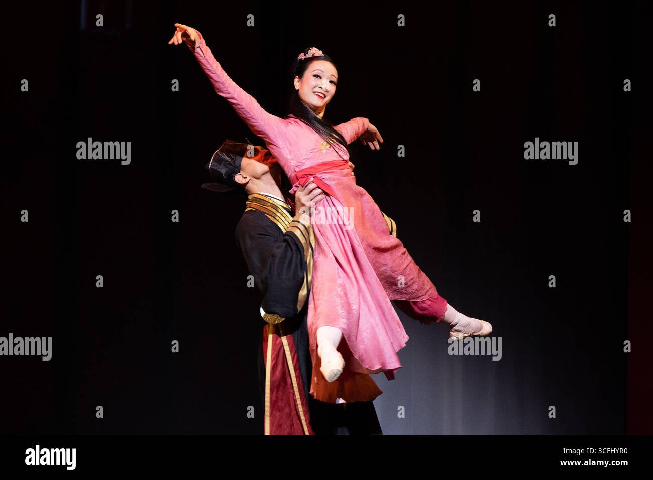 Xuan Cheng as Zhu Yingtai and Garry Corpuz as Zhu father perform during ...