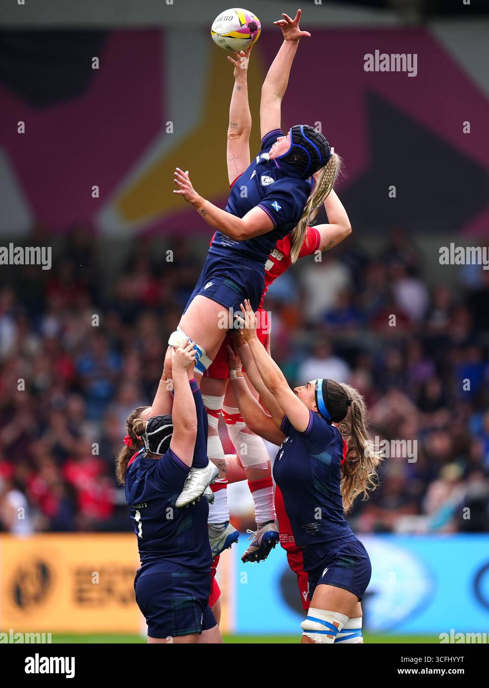Scotland's Sarah Bonar and Wales' Gwen Crabb compete in a line-out ...