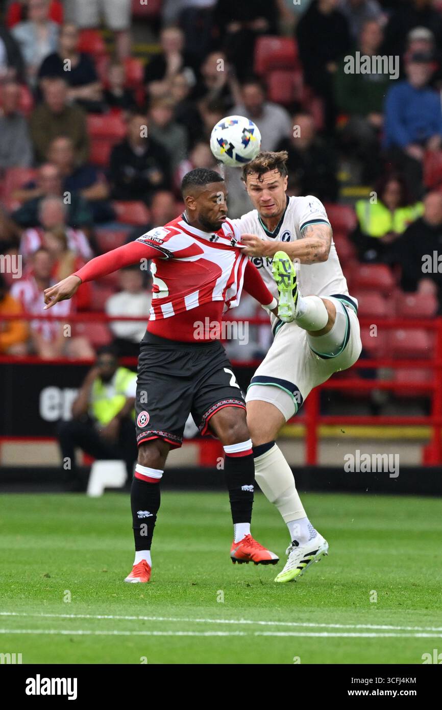Sheffield United's Tyrese Campbell (left ) and Millwall's Jake Cooper ...