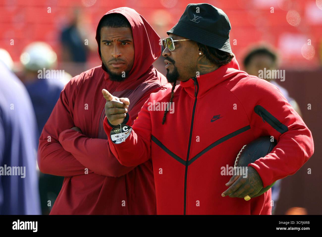 Former NFL running back Marshawn Lynch speaks with Washington ...