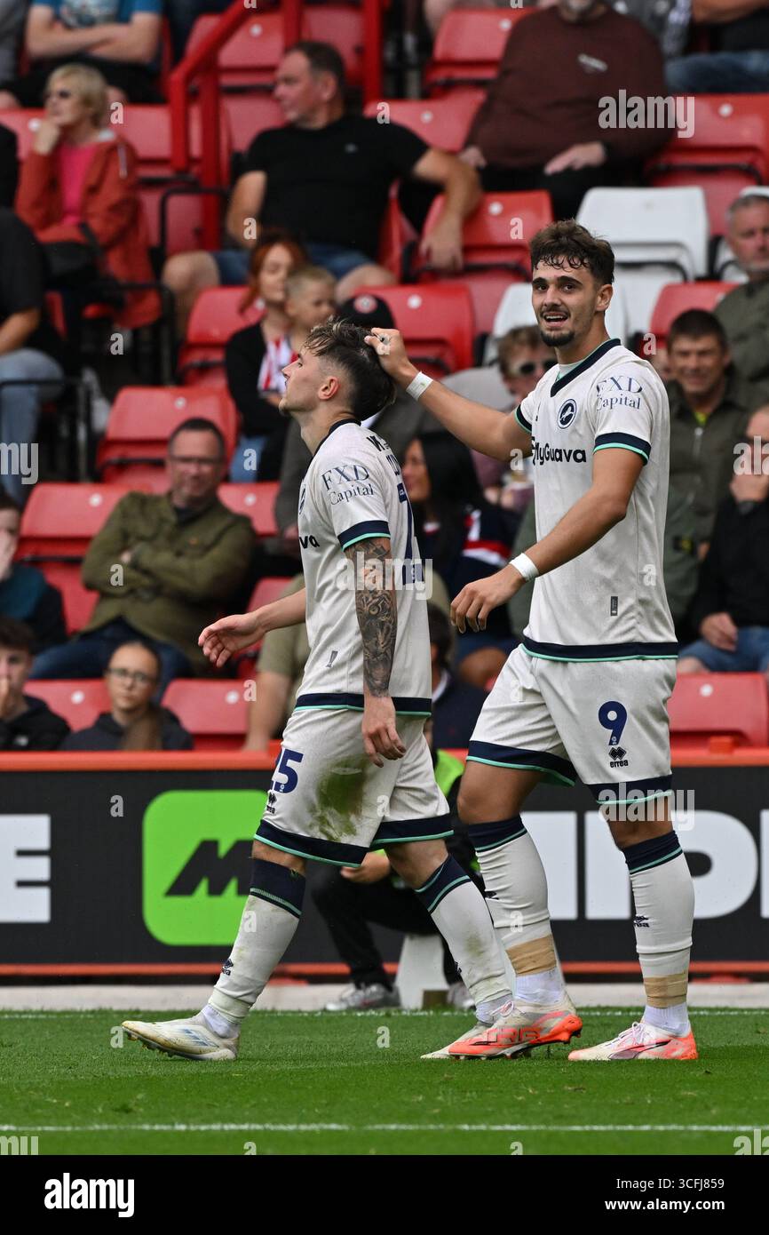 Millwall's Luke Cundle celebrates scoring his sides first goal with ...
