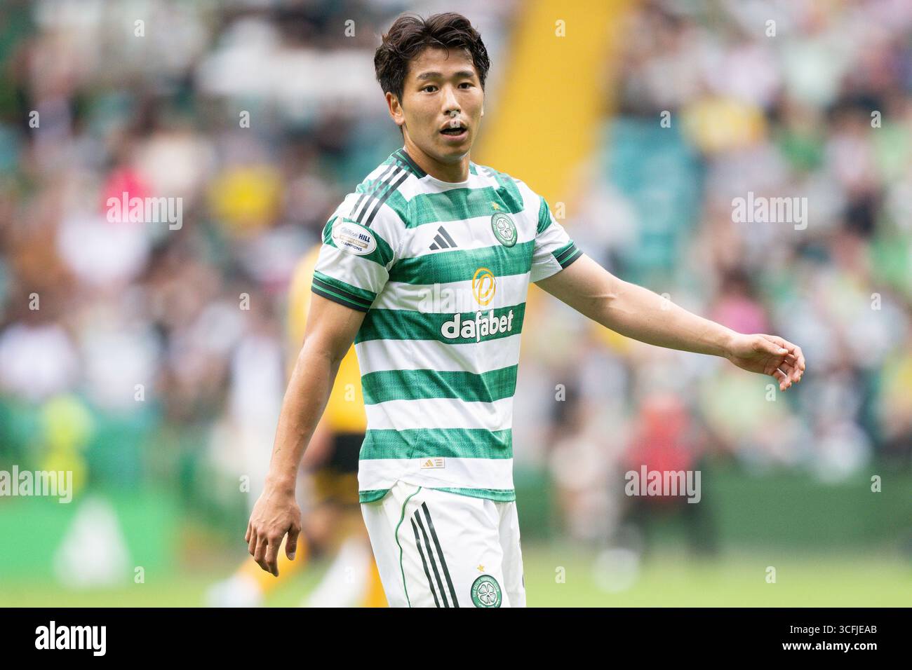 GLASGOW, SCOTLAND - AUGUST 23: Celtic’s Shin Yamada in action during a William Hill Premiership ...