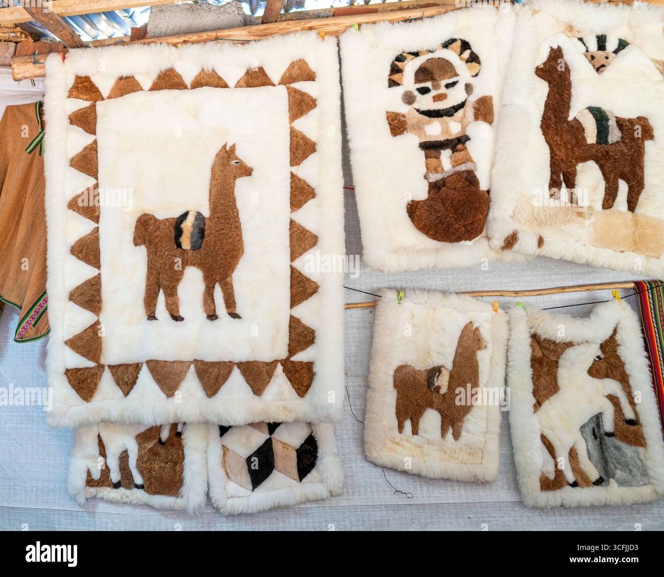 Handmade Andean rugs crafted from alpaca fur with llama and traditional ...