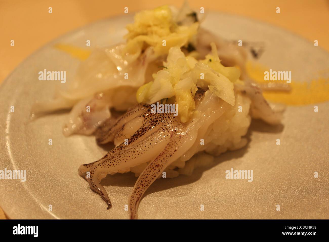 Japanese cuisine: squid tentacles nigiri-zushi in Tokyo, Japan Stock ...