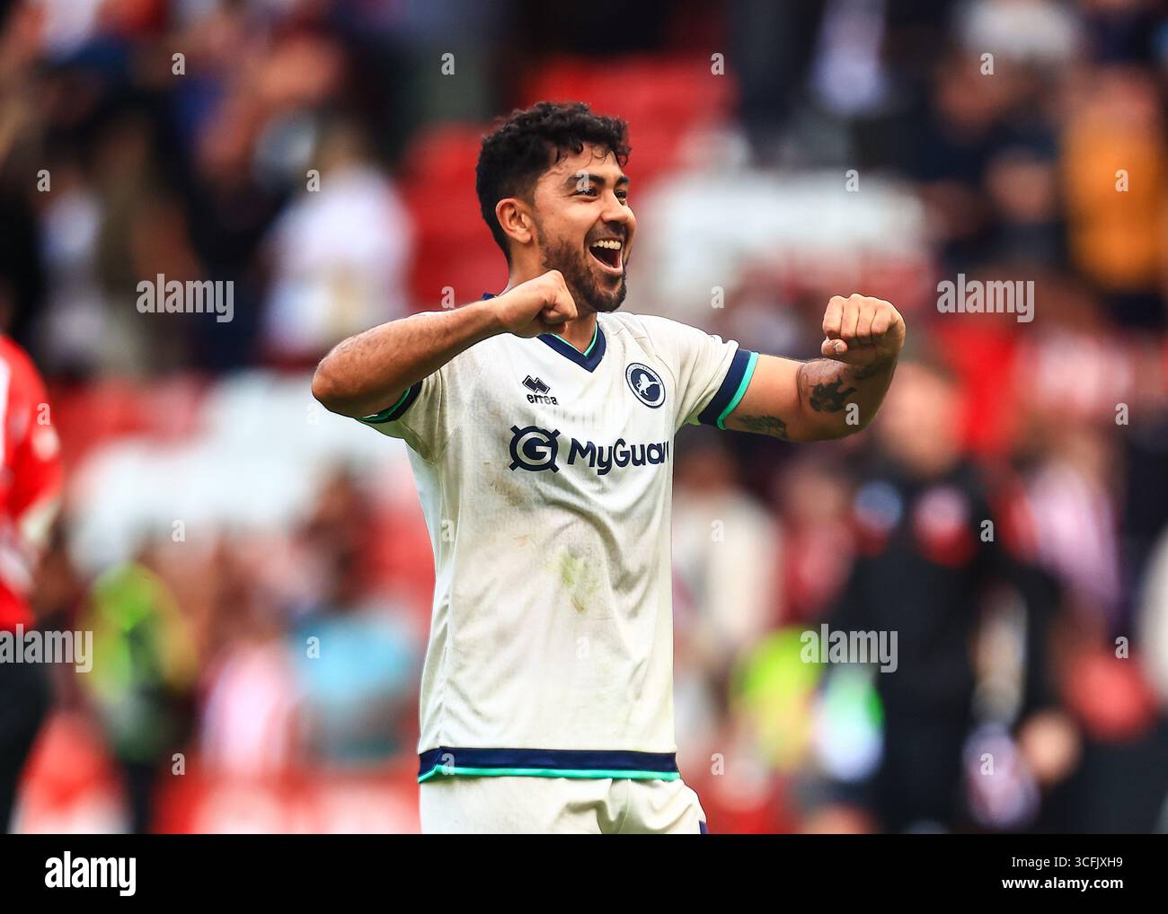 Massimo Luongo of Millwall celebrates his teams win during the Sky Bet ...
