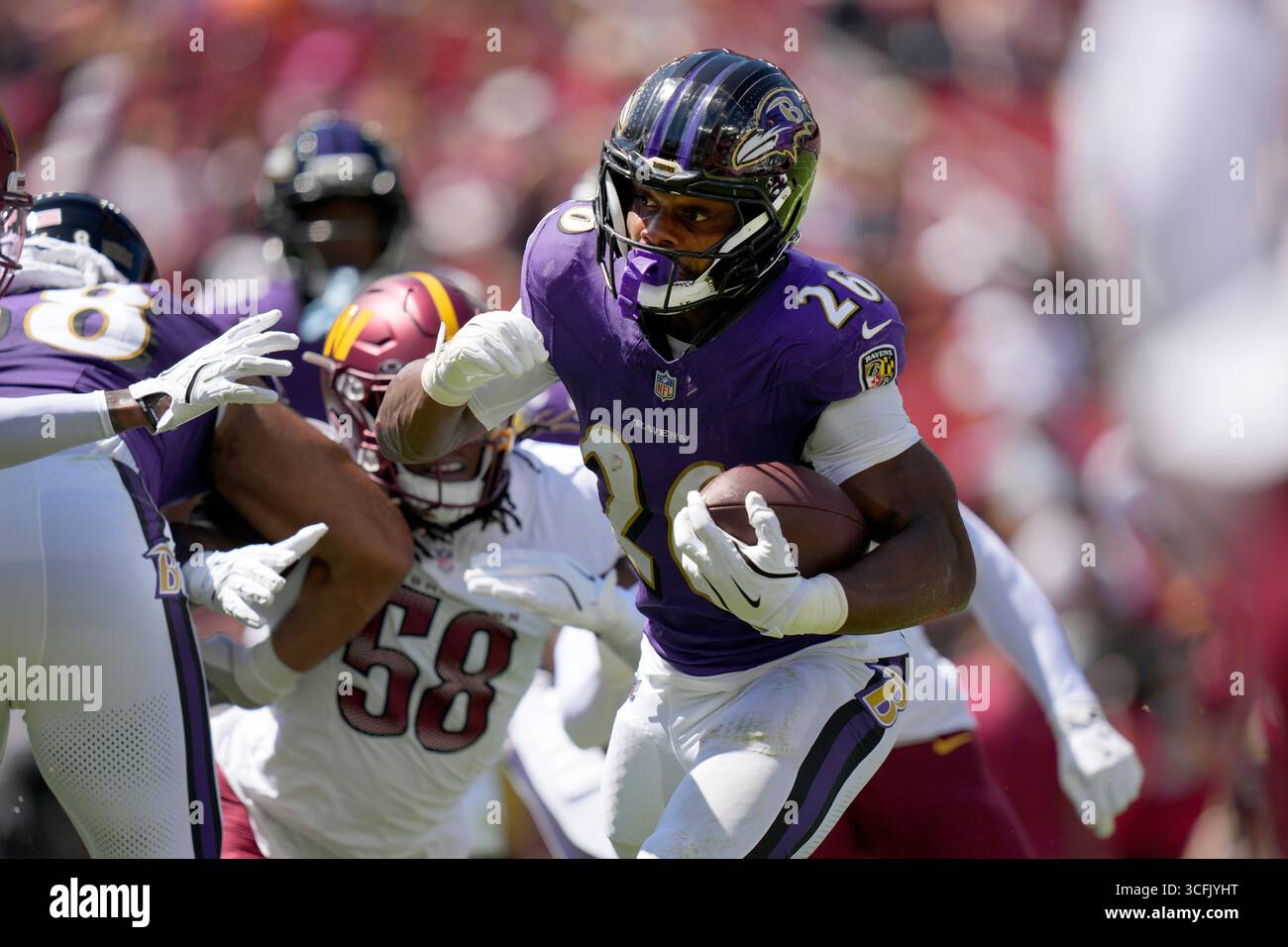 Baltimore Ravens running back Rasheen Ali scores on a touchdown run ...