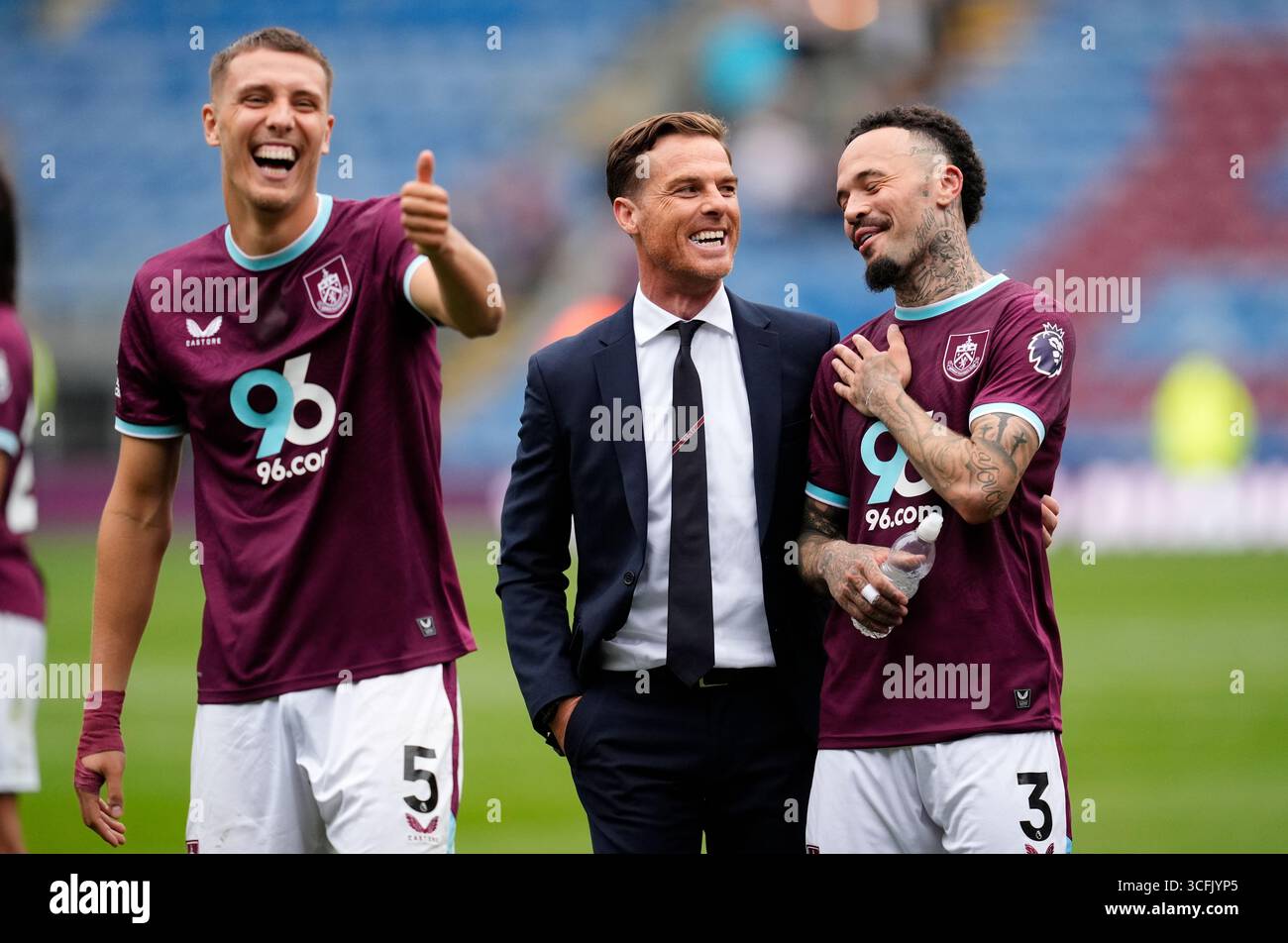 Burnley's manager Scott Parker (centre), Quilindschy Hartman (right ...