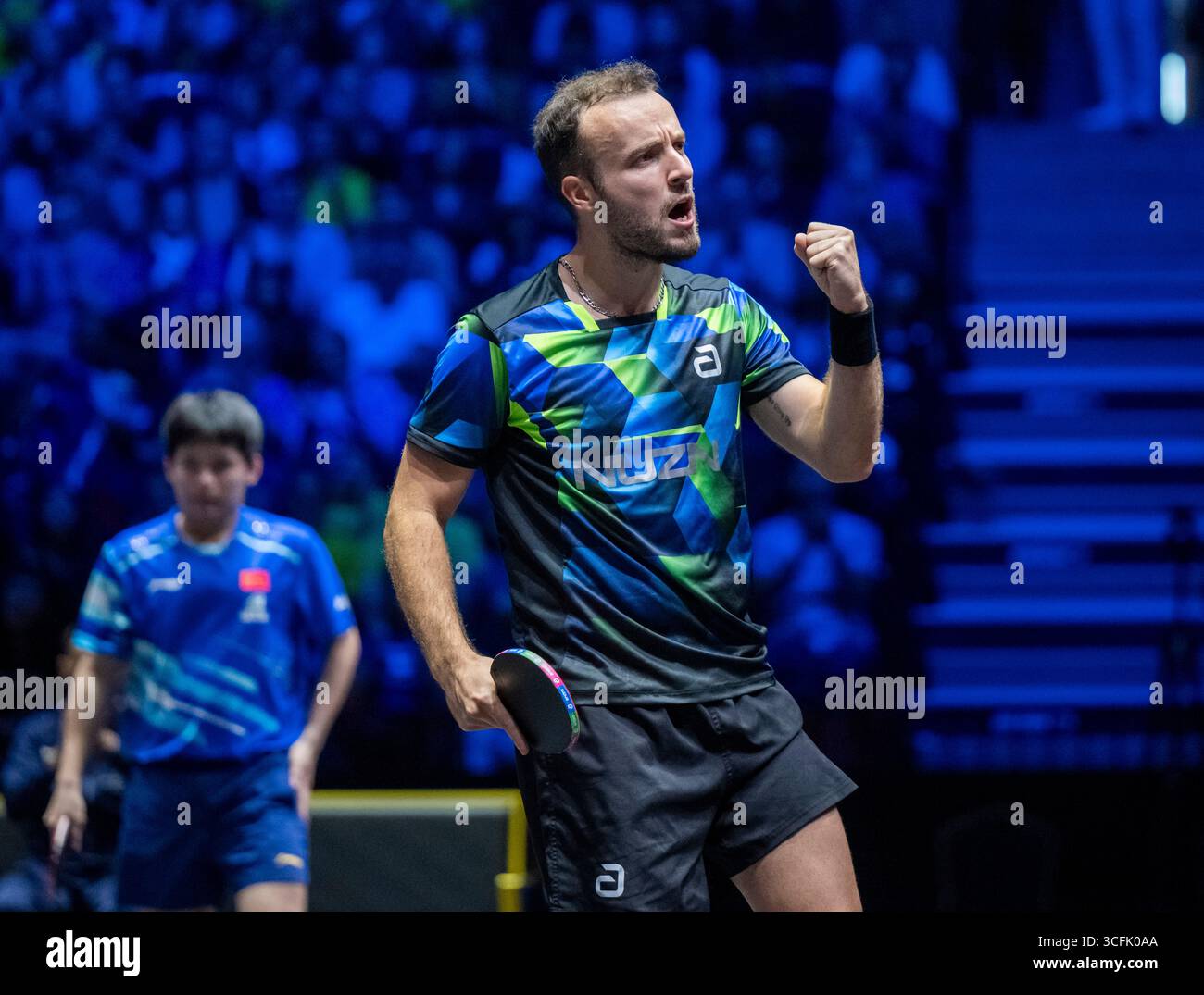 MALMÖ 2025-08-23 Simon Gauzy of France in action against Lin Shidong ...