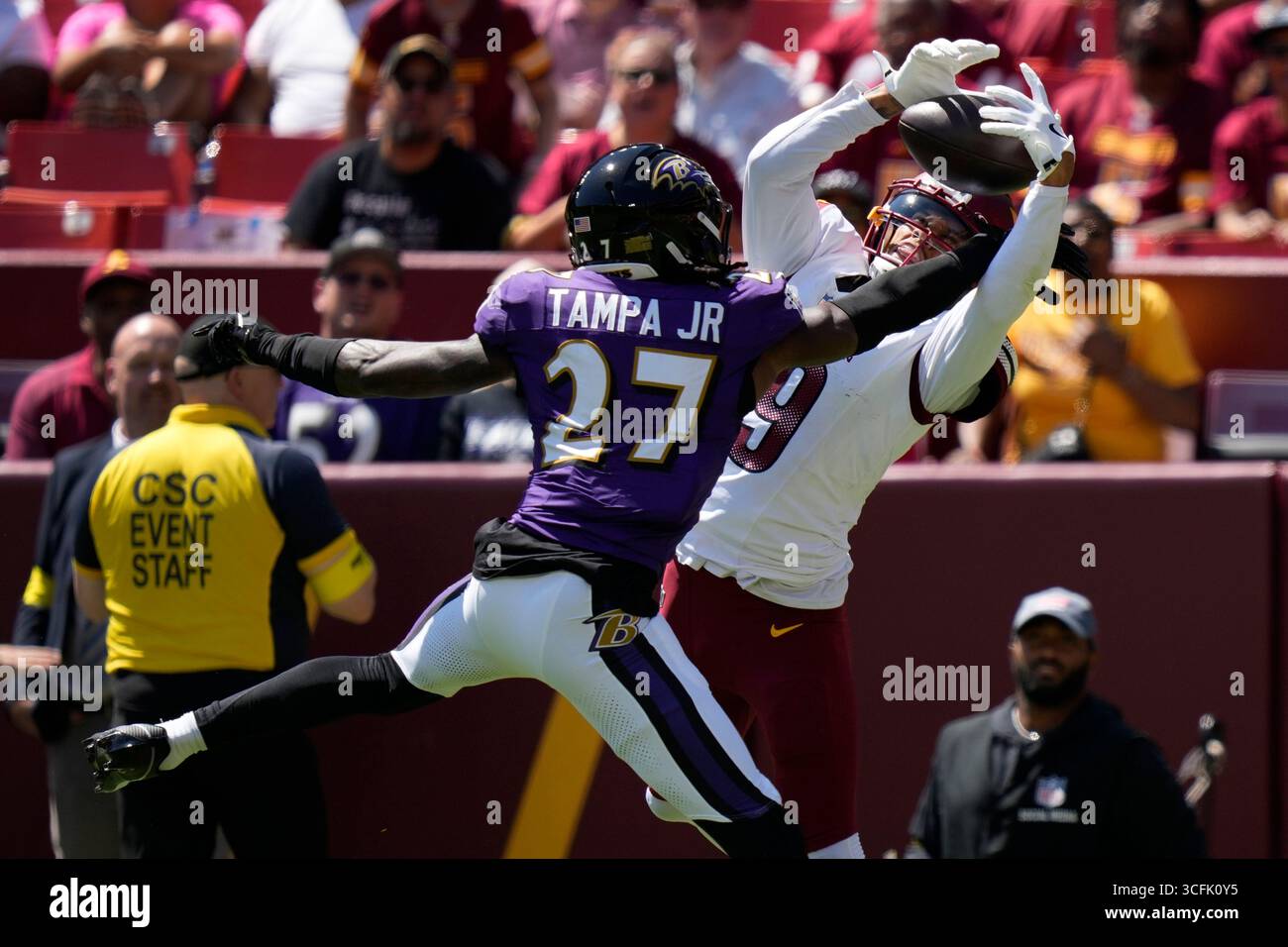 Washington Commanders wide receiver Chris Moore is unable to catch a ...