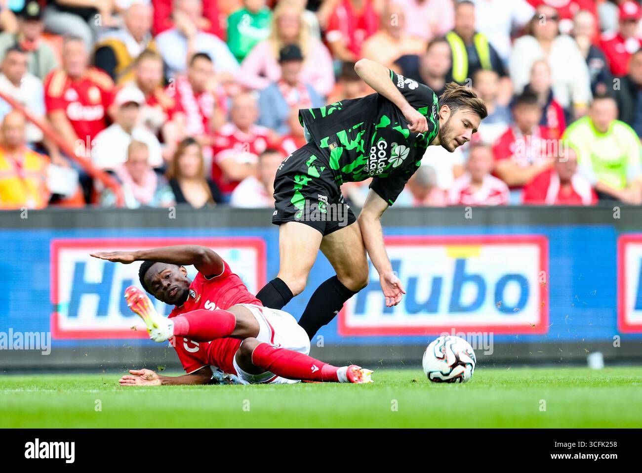 Standard's Rafiki Said and Cercle's Edgaras Utkus fight for the ball ...